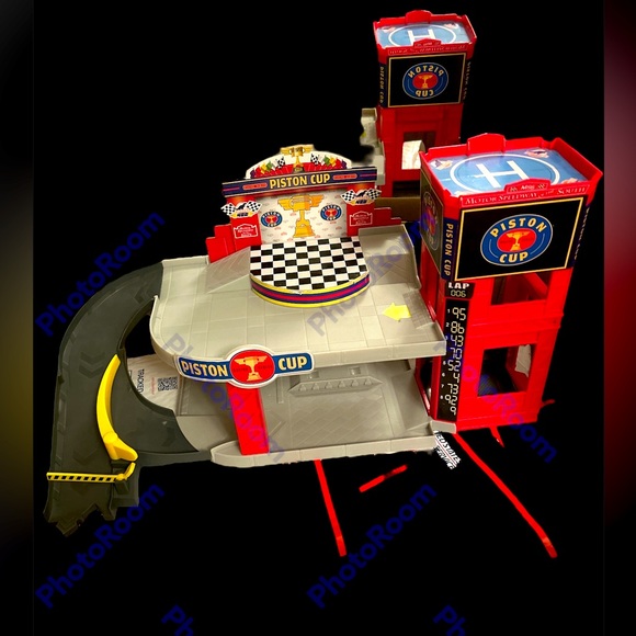 Toys | Piston Cup Racing Garage Toy | Poshmark